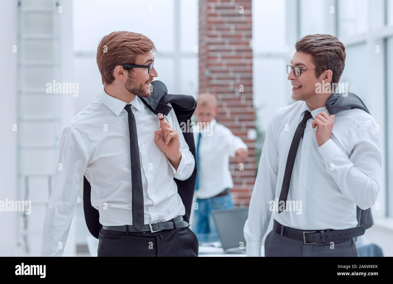business colleagues discussing something in the workplace. office ...