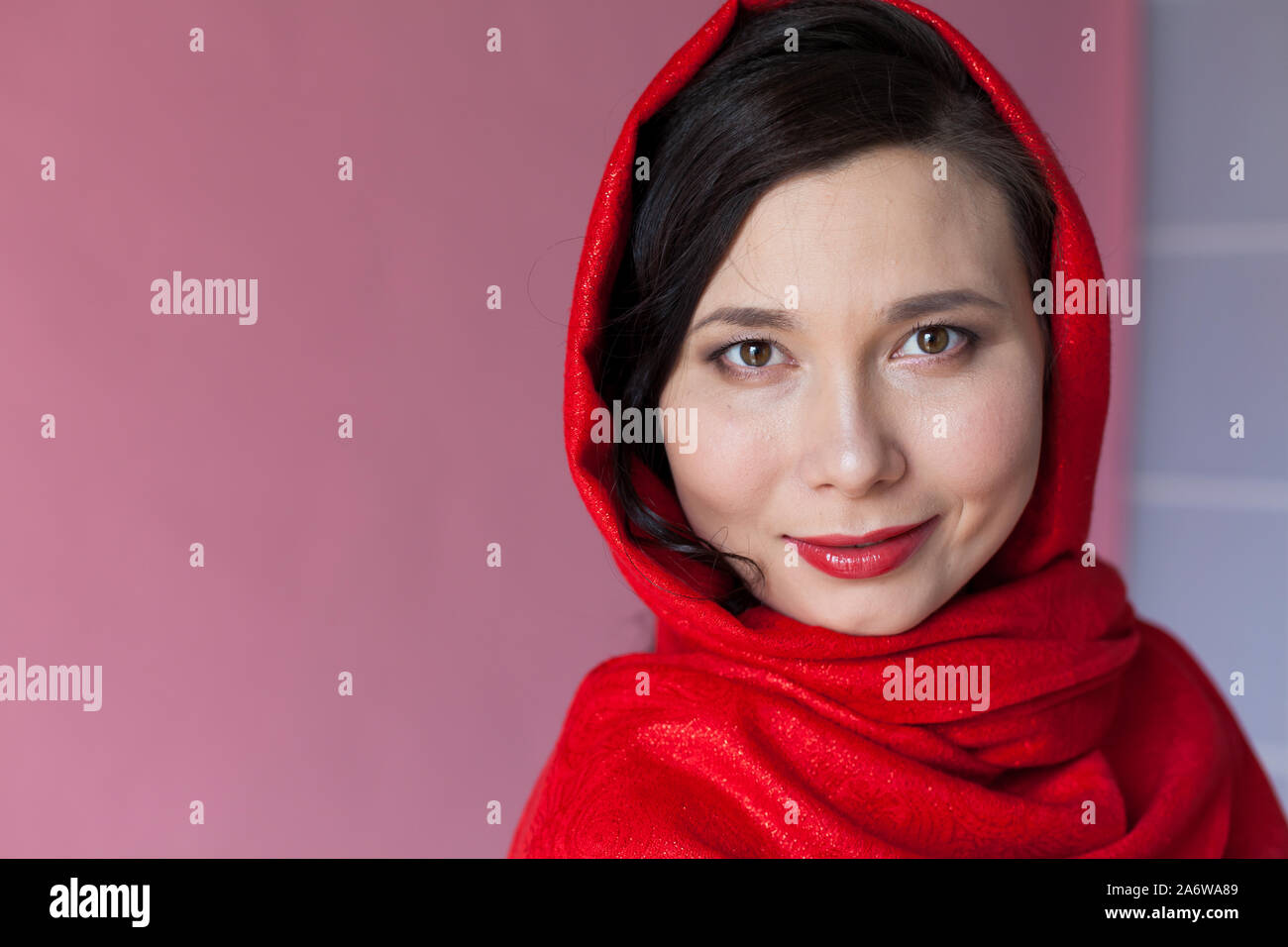 portrait of a beautiful Woman woman with a red handkerchief on her head ...