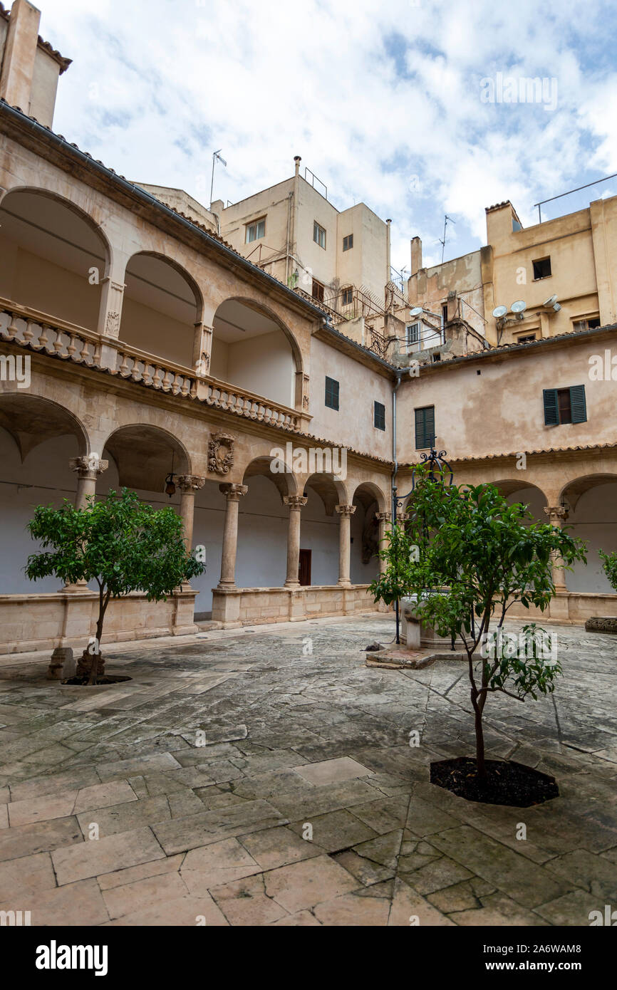 Medieval courtyard next to the Cathedral of Palma in Spain Stock Photo ...