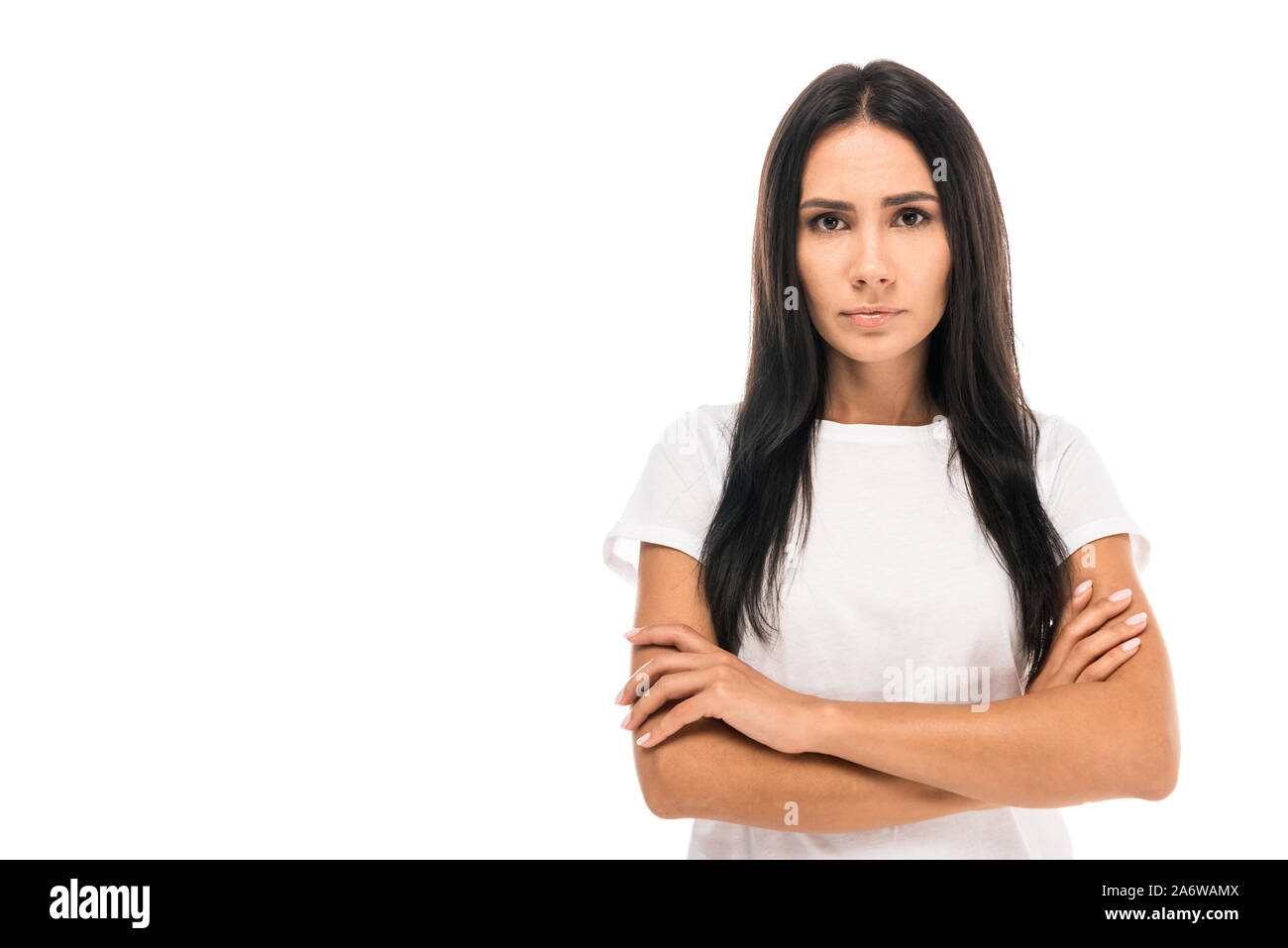 attractive woman standing with crossed arms isolated on white Stock ...