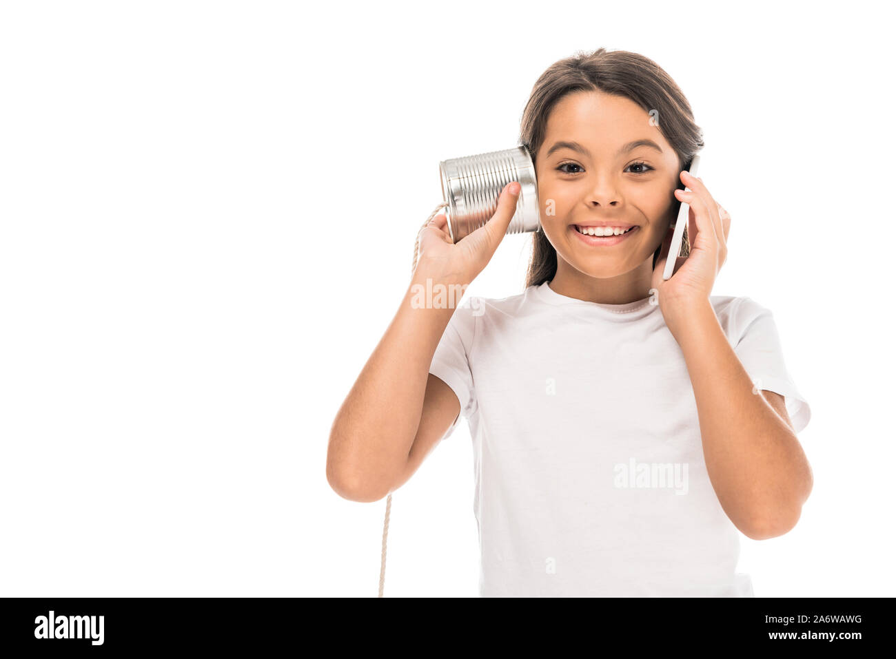 happy kid talking on smartphone and playing with tin can isolated on ...