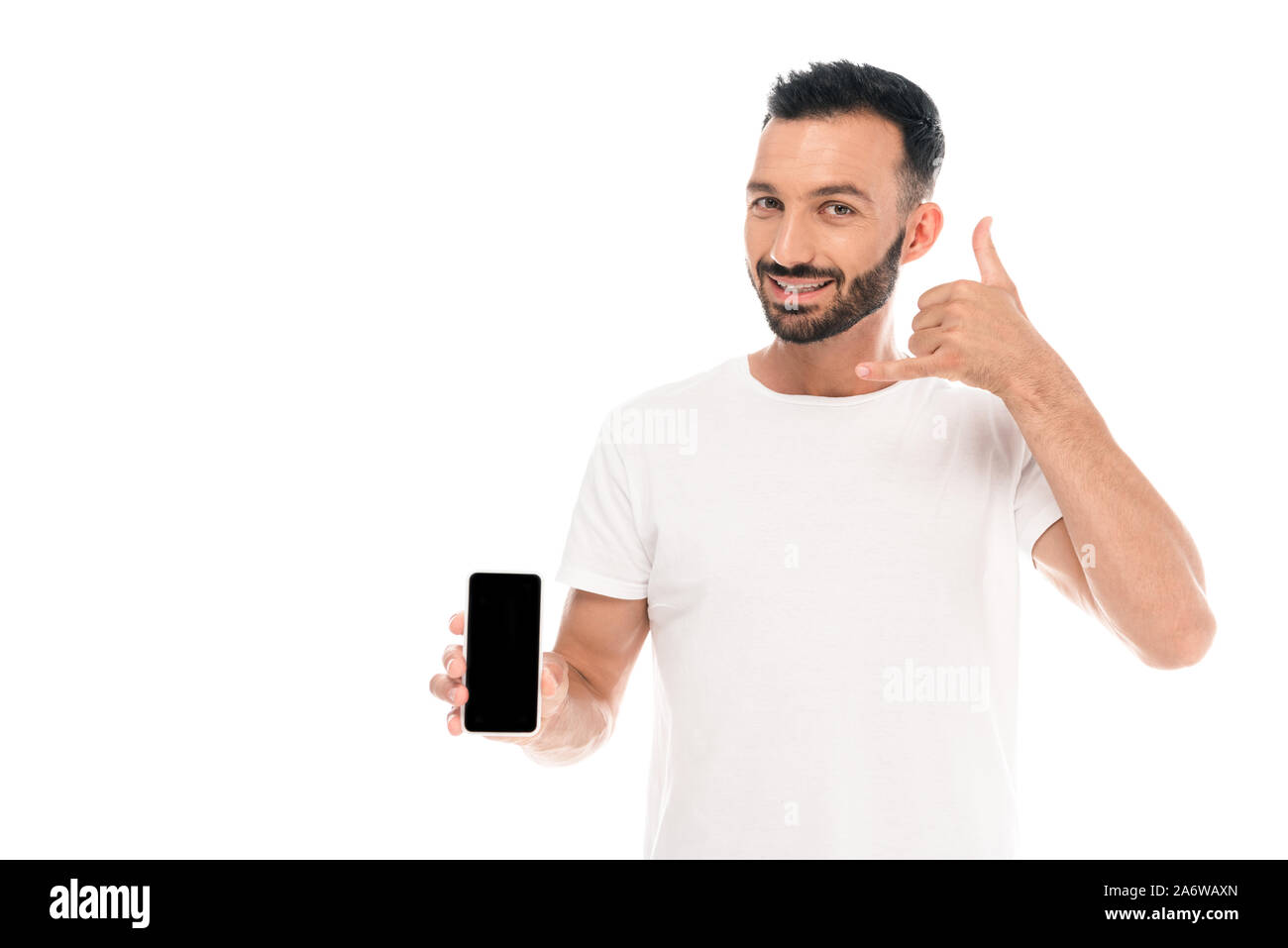 bearded man showing call me sign while holding smartphone with blank ...