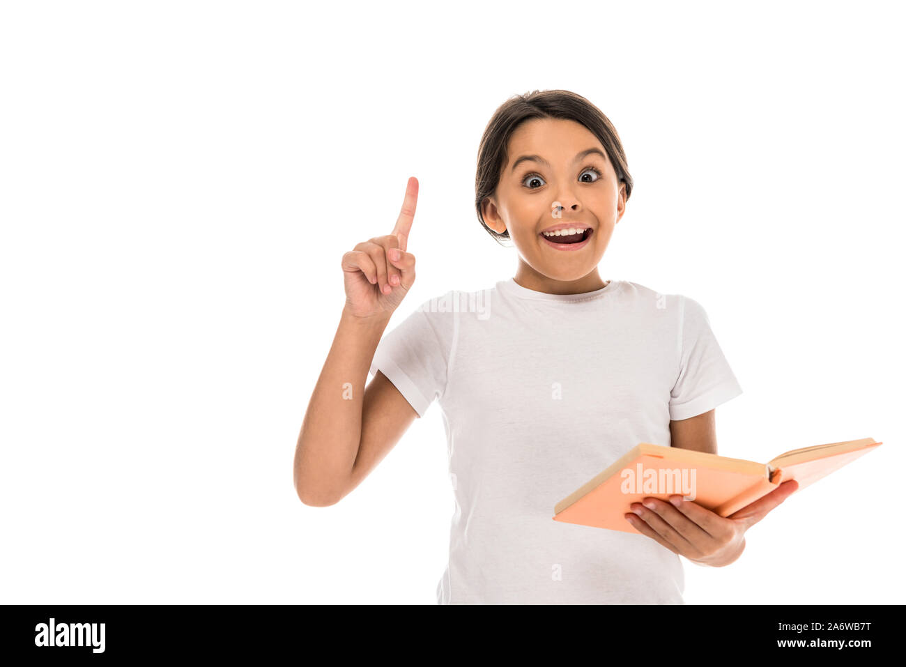 Excited girl pointing book hi-res stock photography and images - Alamy