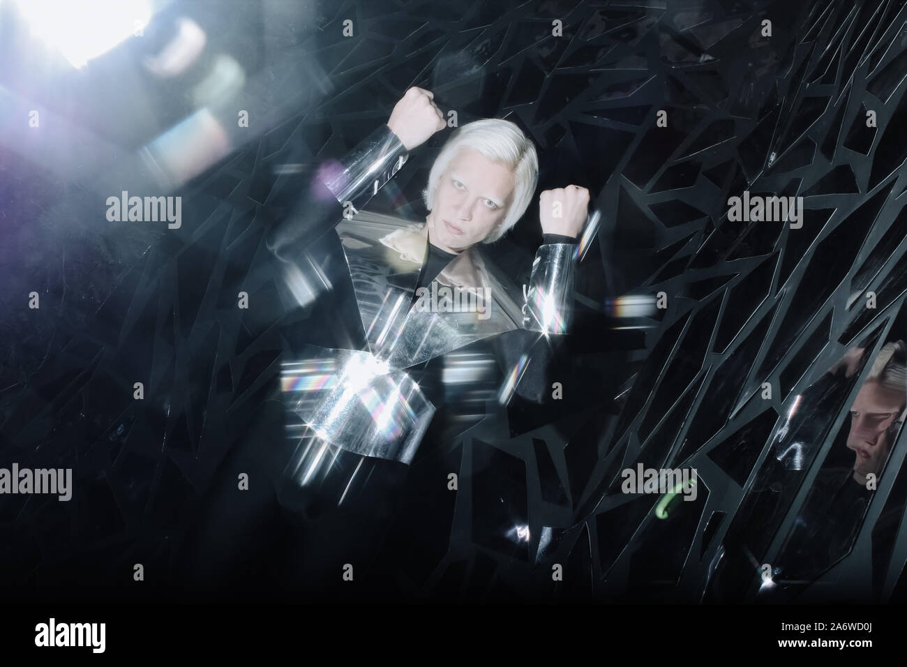 young blonde albino caucasian man standing in alien cosmos halloween ...