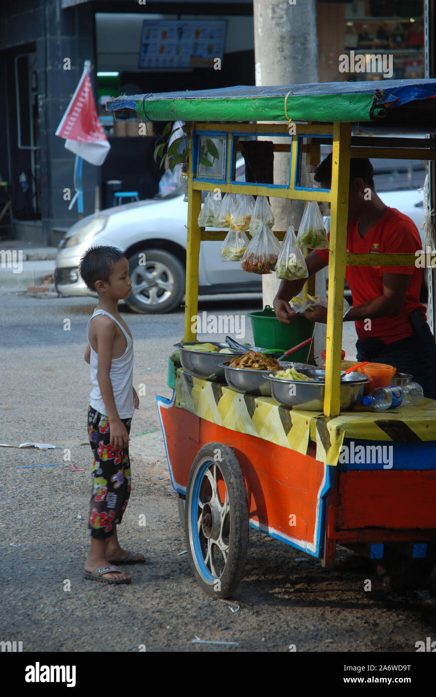 People eat at a food stall in yangon hi-res stock photography and ...