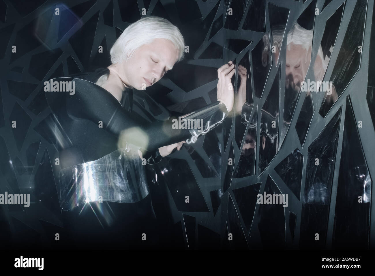 young blonde albino caucasian man standing in alien cosmos halloween ...