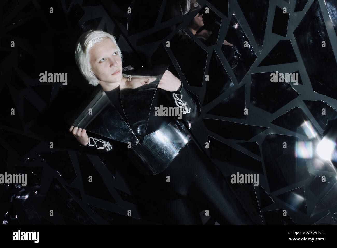 young blonde albino caucasian man standing in alien cosmos halloween ...