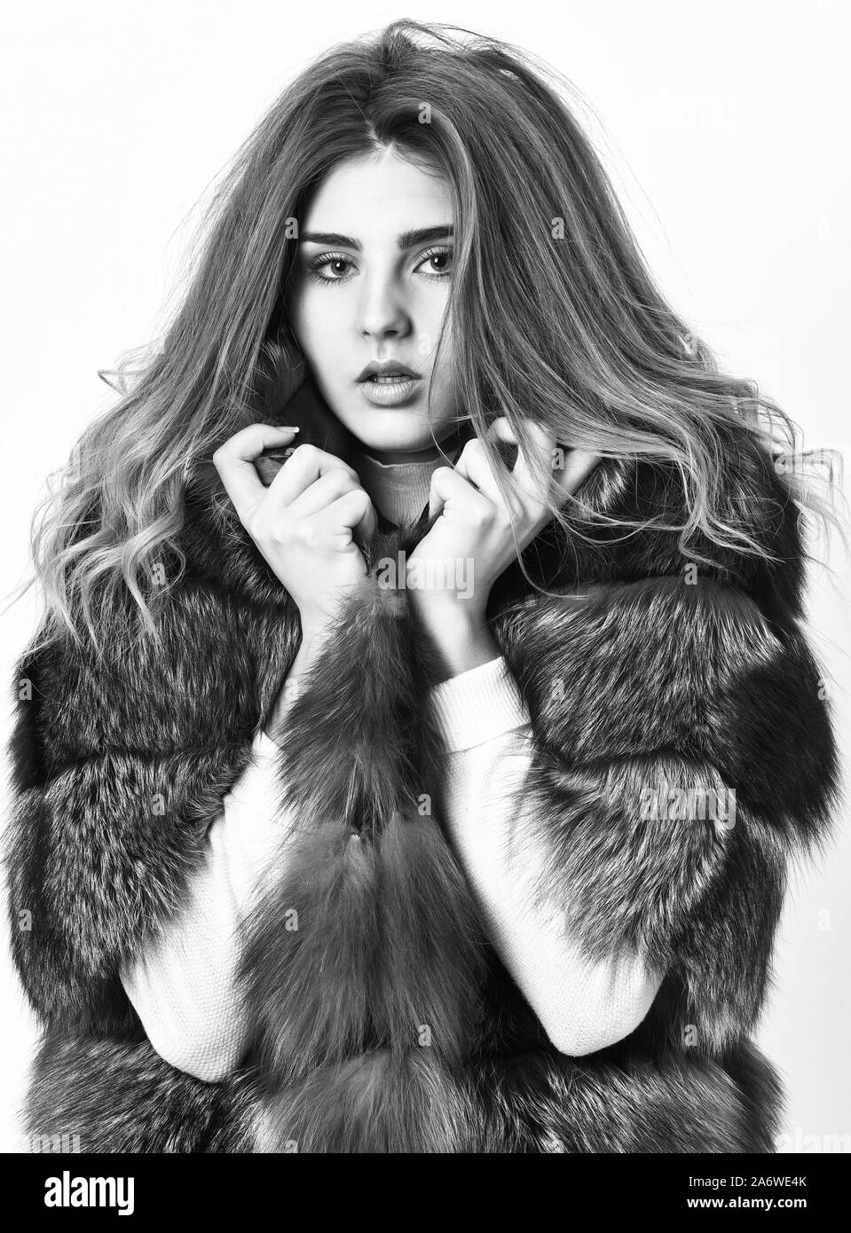 Fur store model enjoy warm in soft fluffy coat with collar. Fur fashion ...