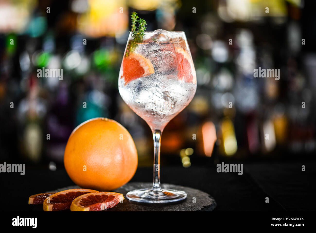 fresh gin tonic beverage with fruits & spices Stock Photo - Alamy