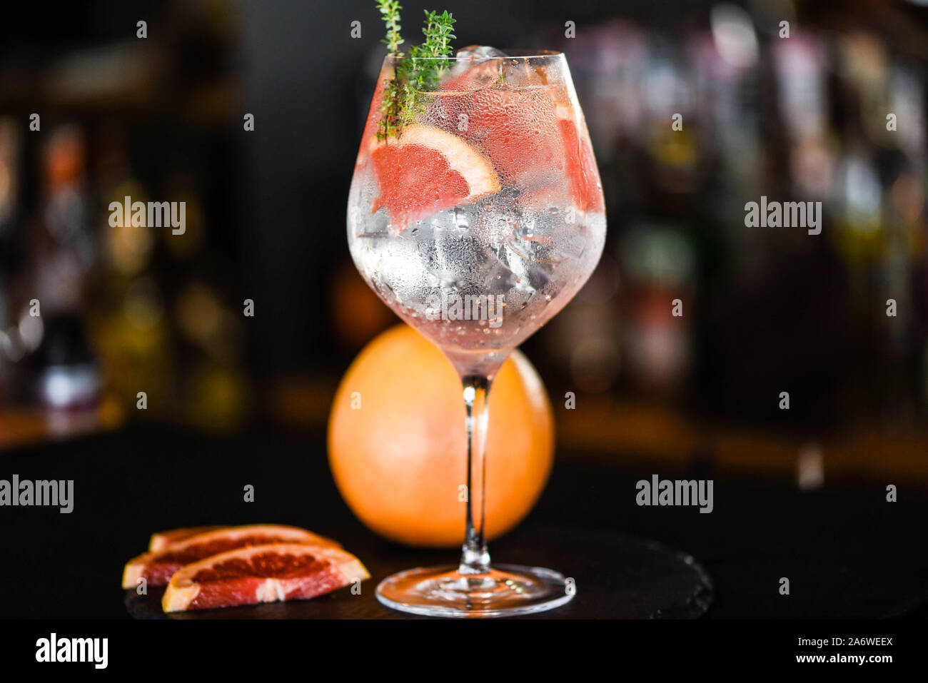 fresh gin tonic beverage with fruits & spices Stock Photo - Alamy