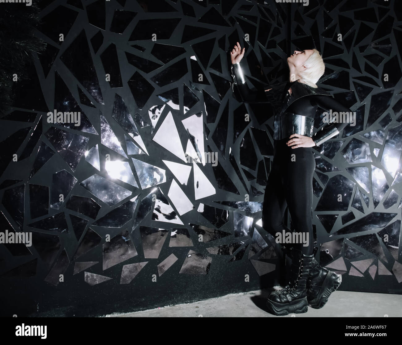 young blonde albino caucasian man standing in alien cosmos halloween ...