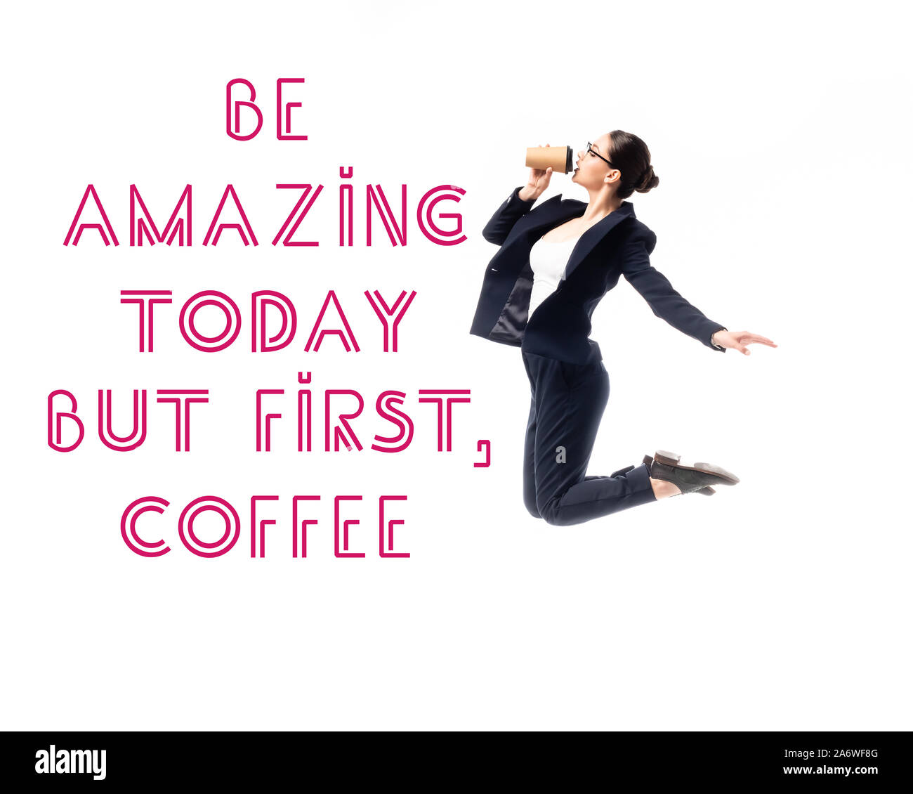 young businesswoman jumping while drinking coffee to go near be amazing ...