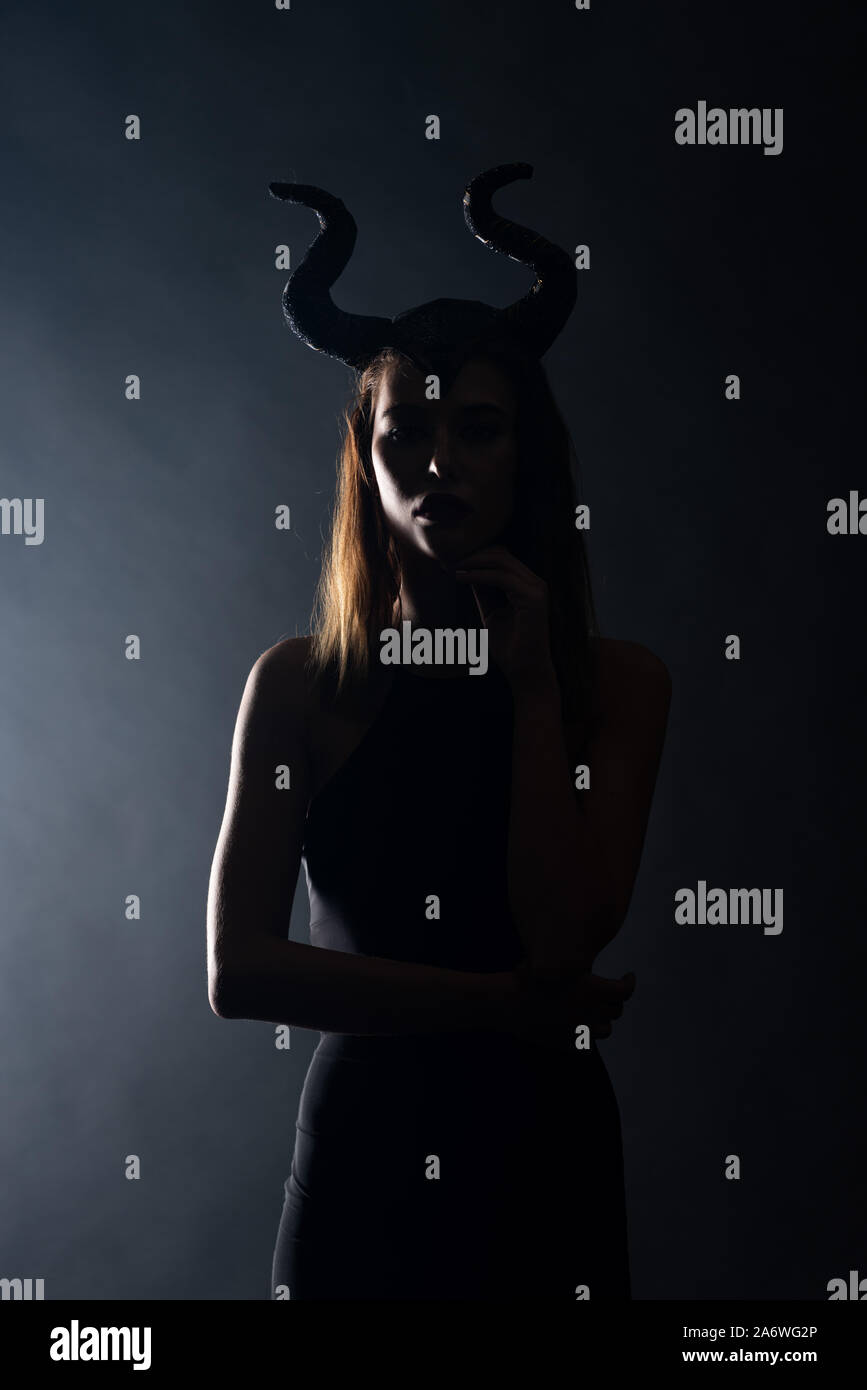 Woman with horns hi-res stock photography and images - Alamy