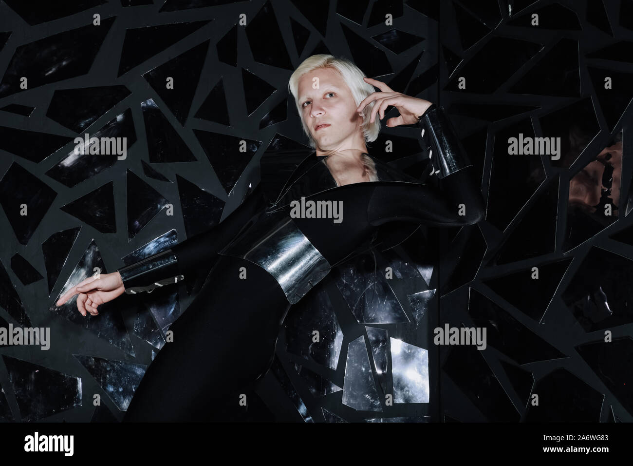 young blonde albino caucasian man standing in alien cosmos halloween ...