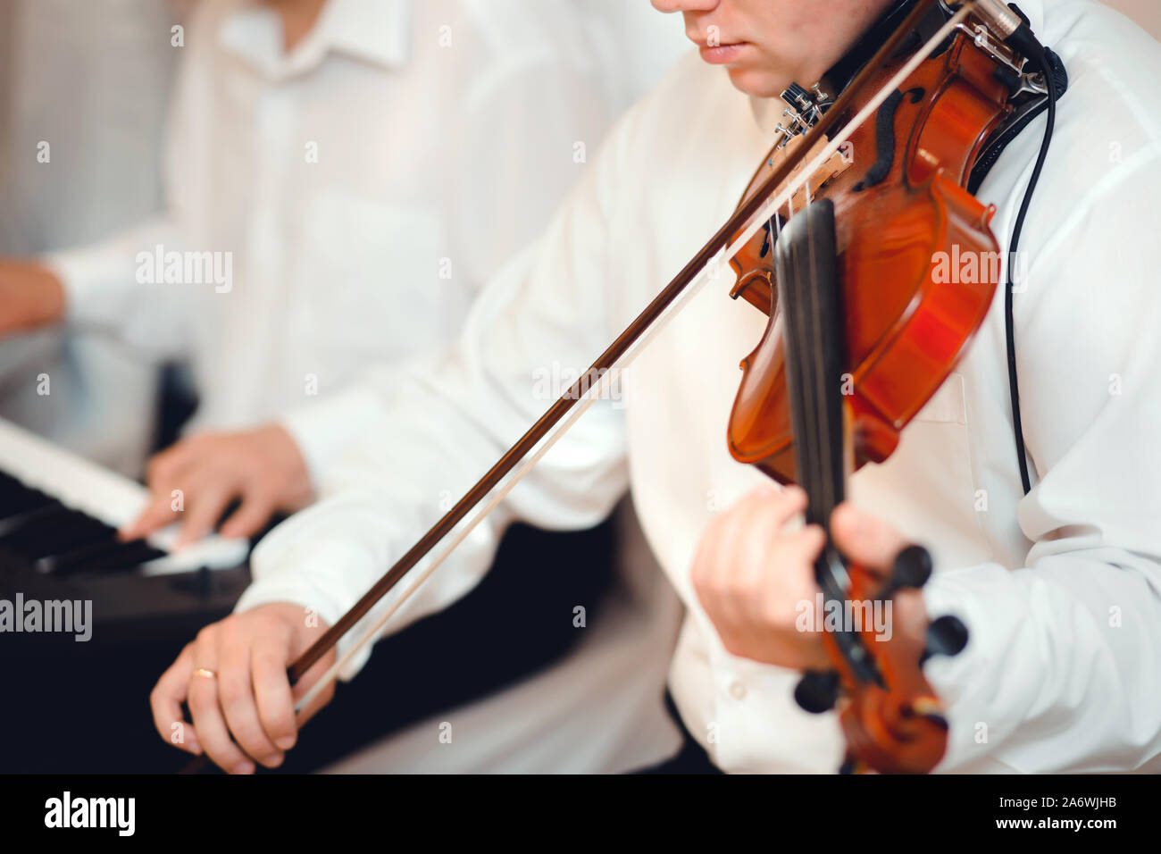 Violin playing viola musician. Man violinist classical musical ...
