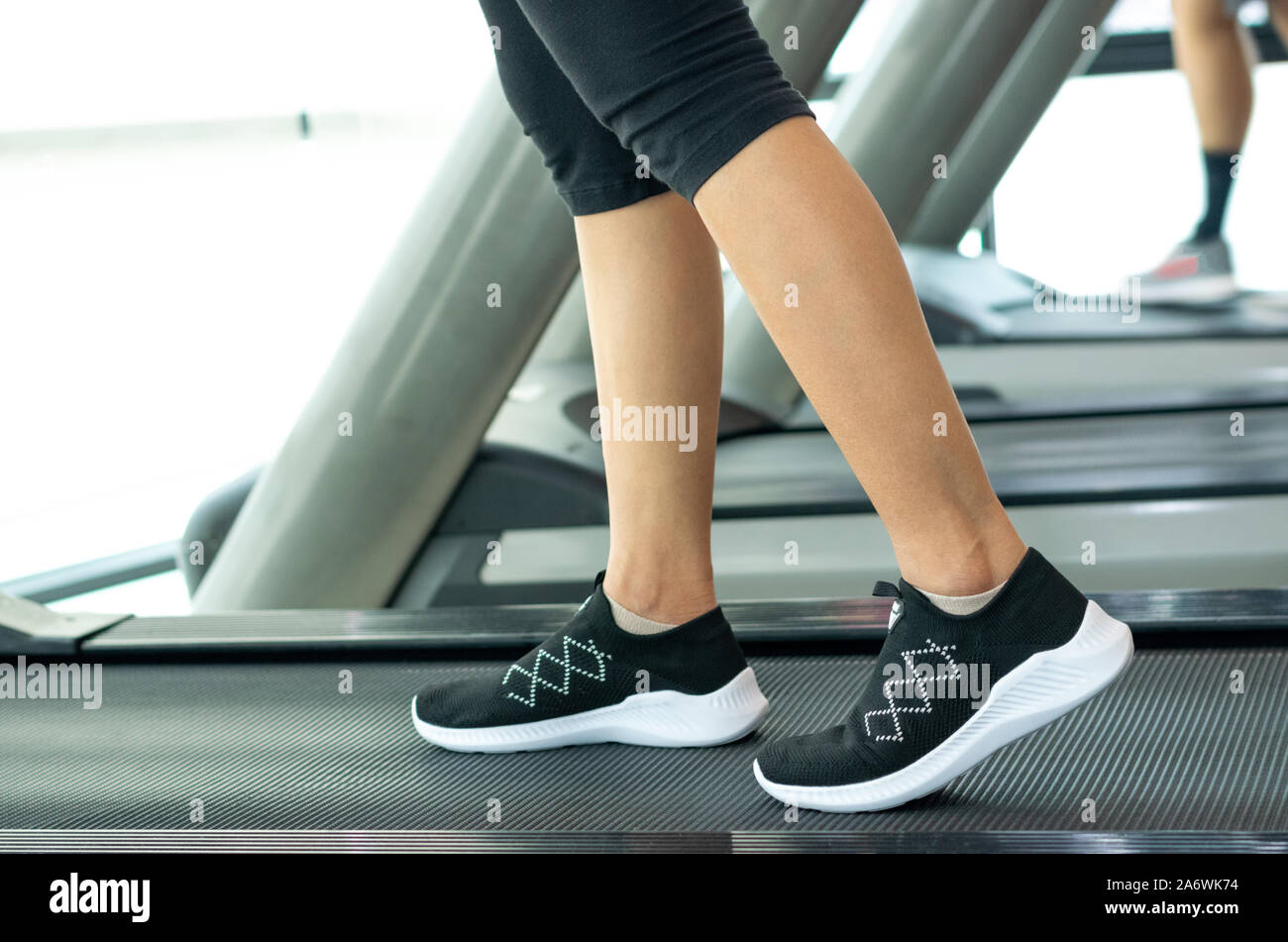 Womans muscular legs on treadmill hi-res stock photography and images ...