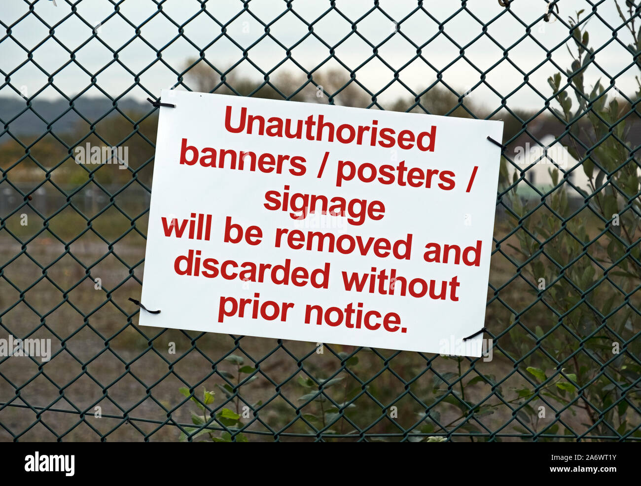 A sign warning that “Unauthorised banners / posters / signage will be ...