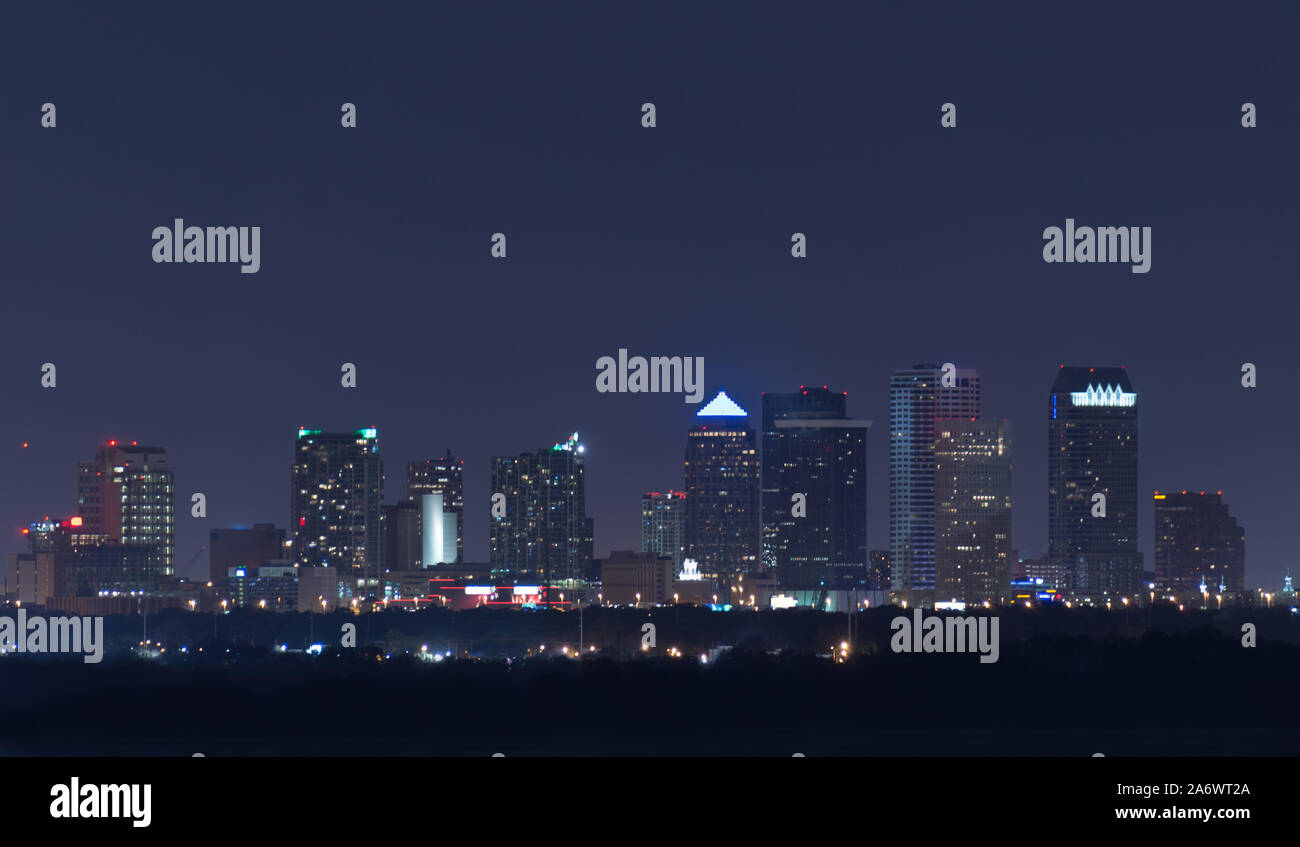 Night view of Tampa Florida skyline with lighted buildings and dark ...