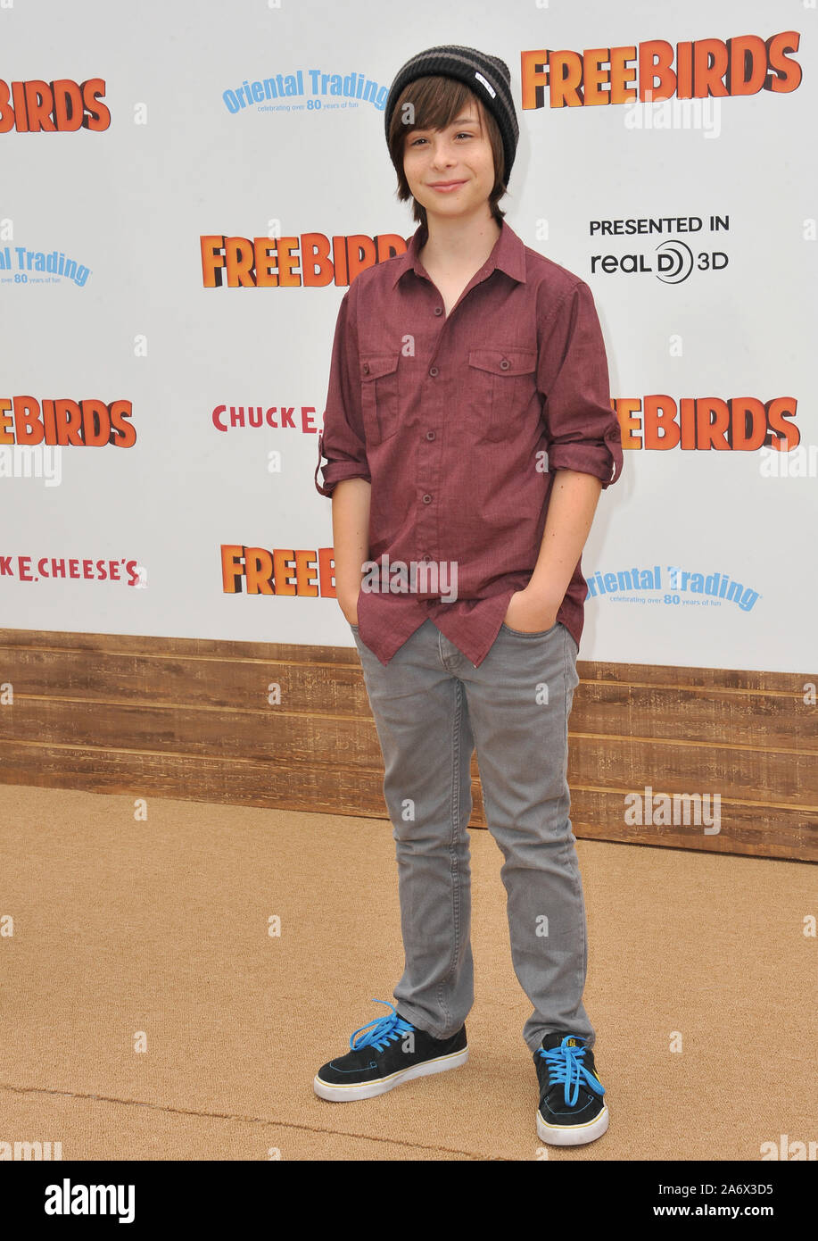 LOS ANGELES, CA. October 13, 2013: Robbie Tucker at the world premiere ...