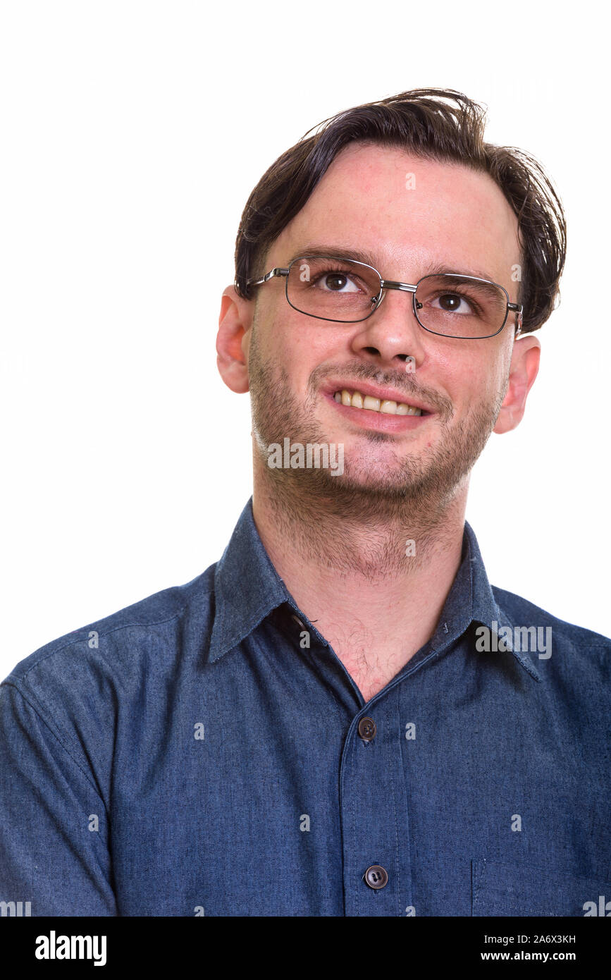 Face of formal young happy man smiling while thinking Stock Photo - Alamy