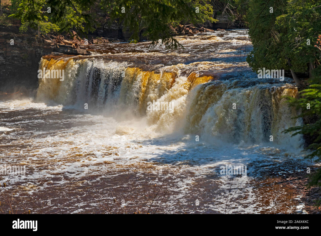 Powerful Manabezho Falls in the Spring on the Presque Isle River in ...