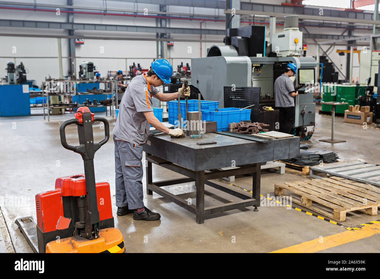Employee working on the factory on machine. Industry, Distribution ...