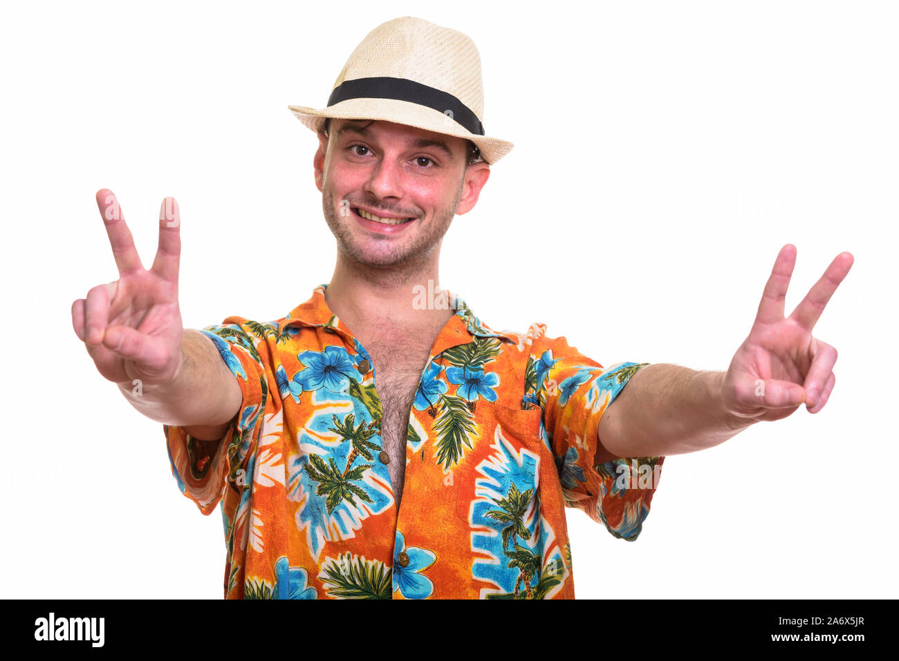 Young man giving peace sign hi-res stock photography and images - Alamy