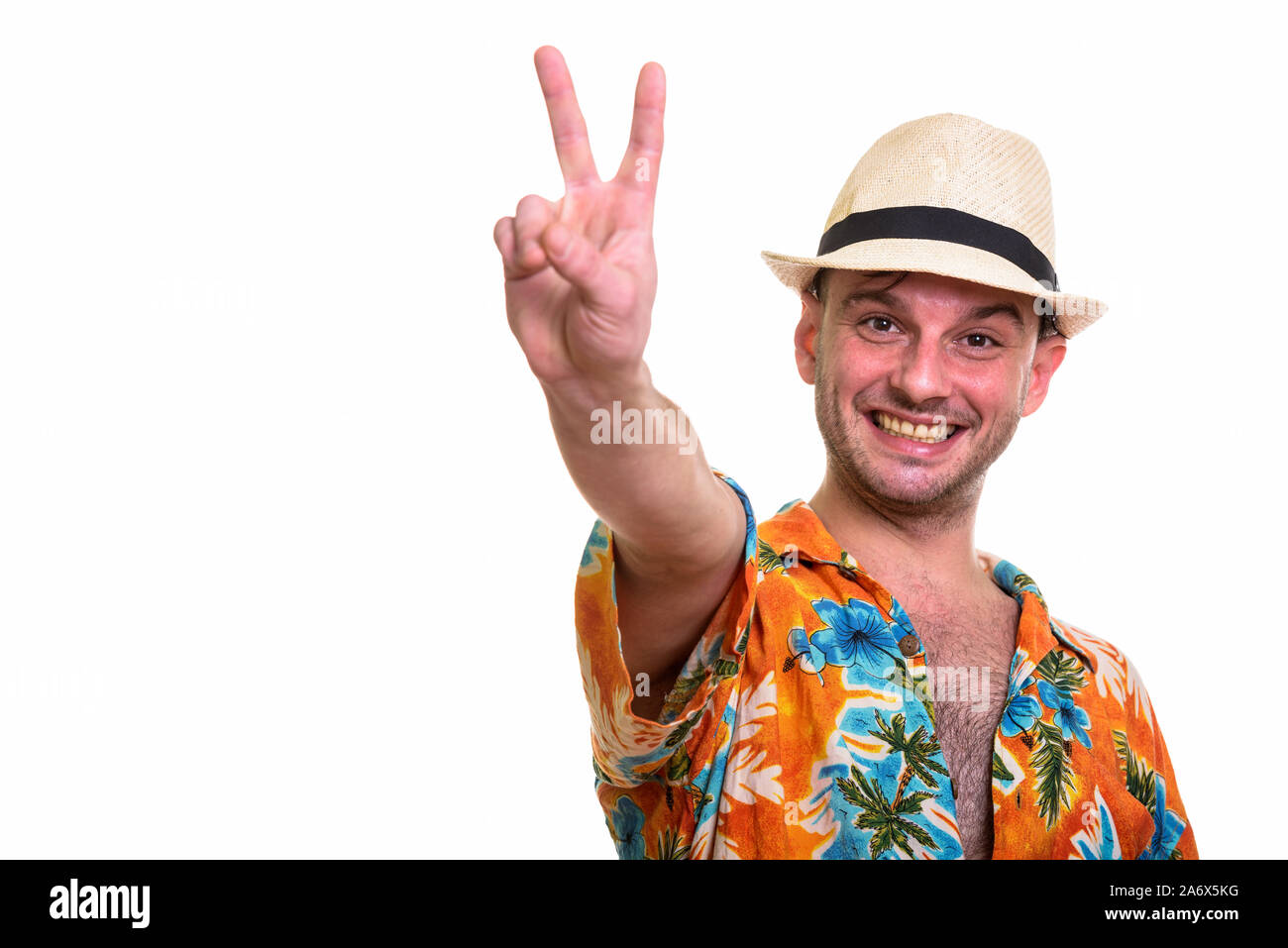 Man smiling peace sign hi-res stock photography and images - Alamy