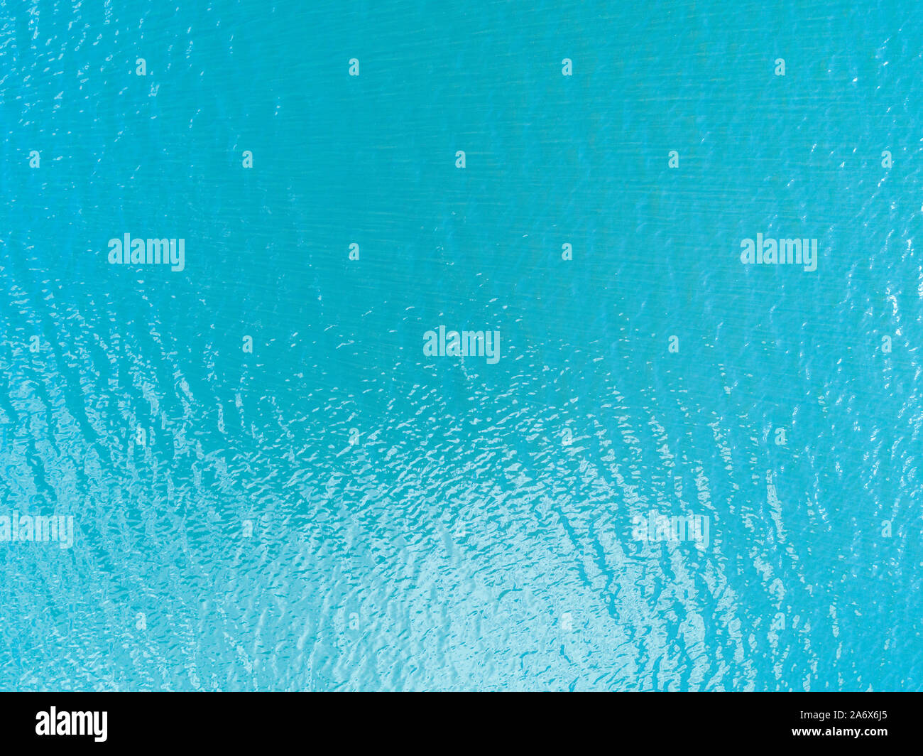 Aerial view of a Crystal clear sea water texture. View from above ...