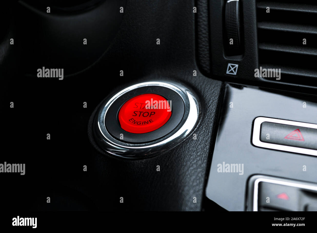 Car dashboard with focus on engine start stop button. Modern car ...
