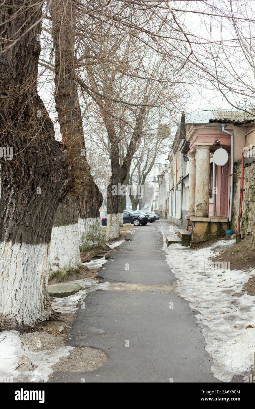 Winter street with a view of the houses Stock Photo - Alamy