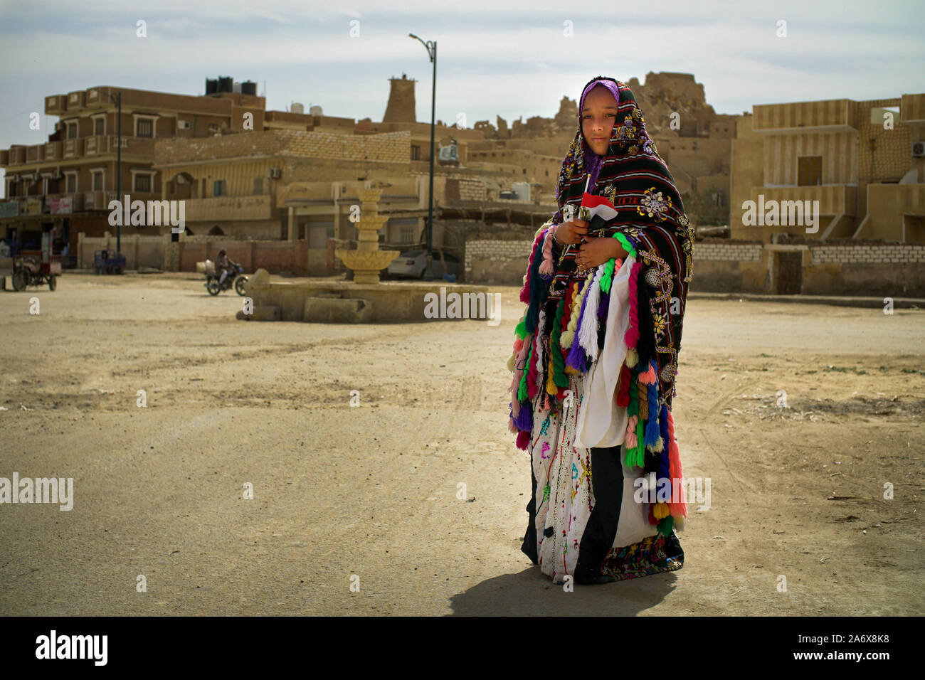 A female student is seen wearing the Berber colorful traditional women ...