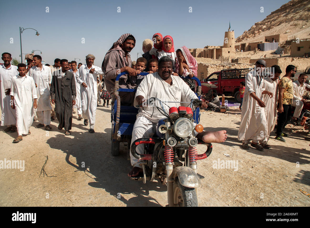 A big Siwan family on a tuk-tuk among hundreds of Siwan people attend ...