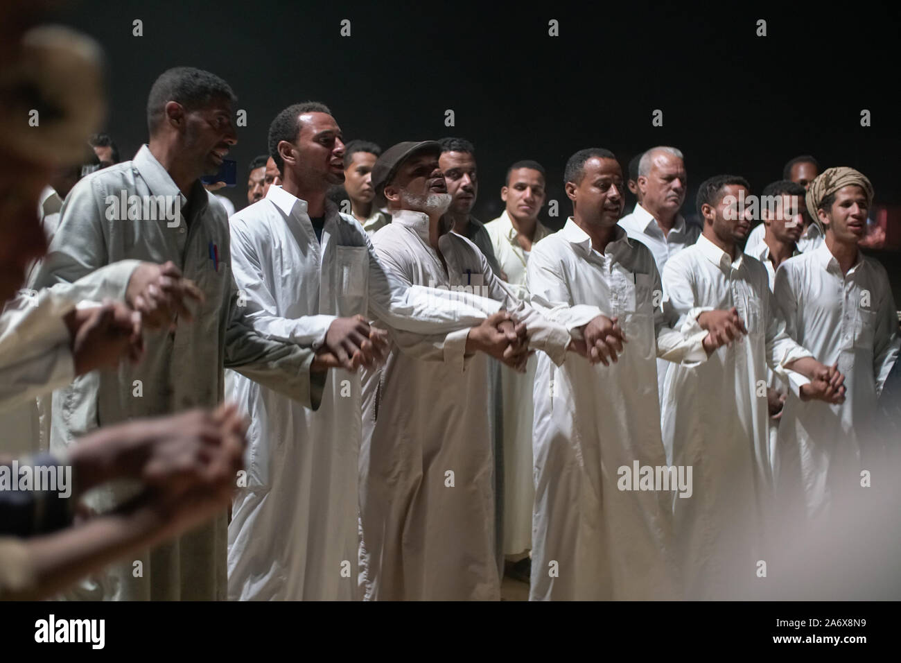 Hundreds of Siwan people form a circle (zikr) of peace and forgiveness ...