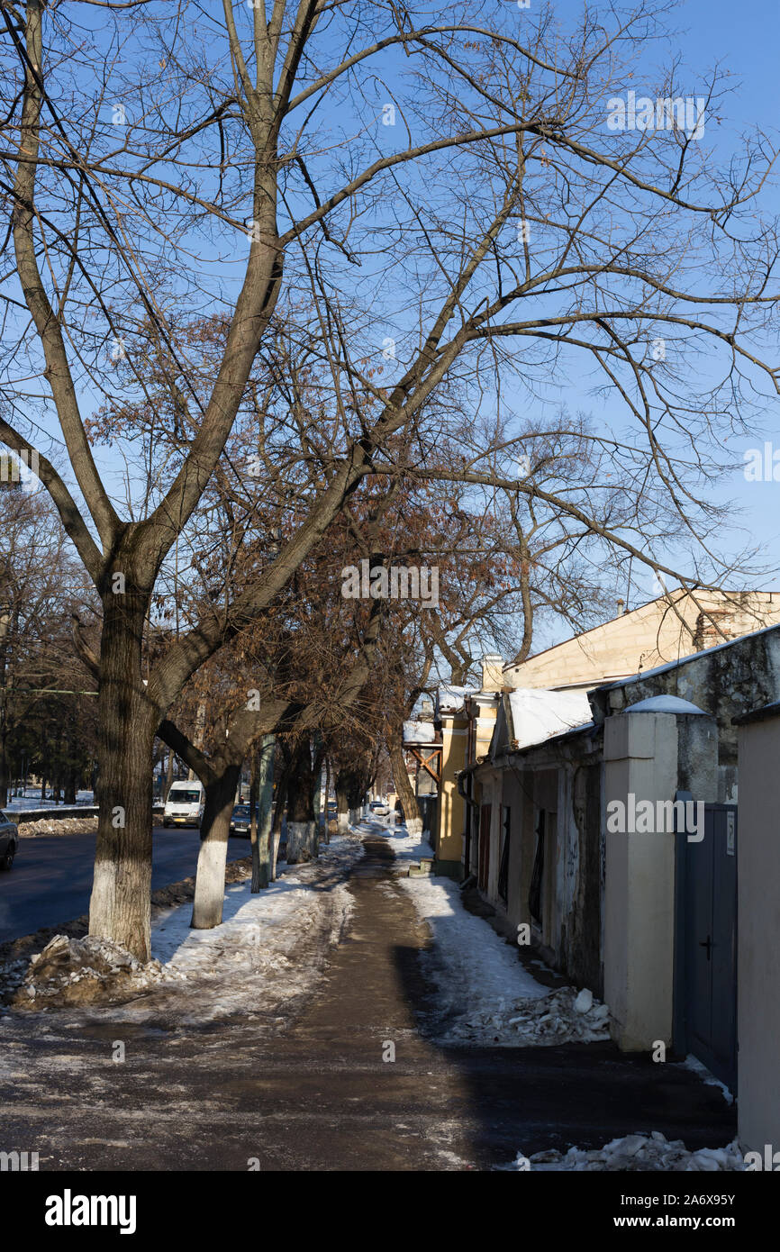 Winter street with a view of the houses Stock Photo - Alamy
