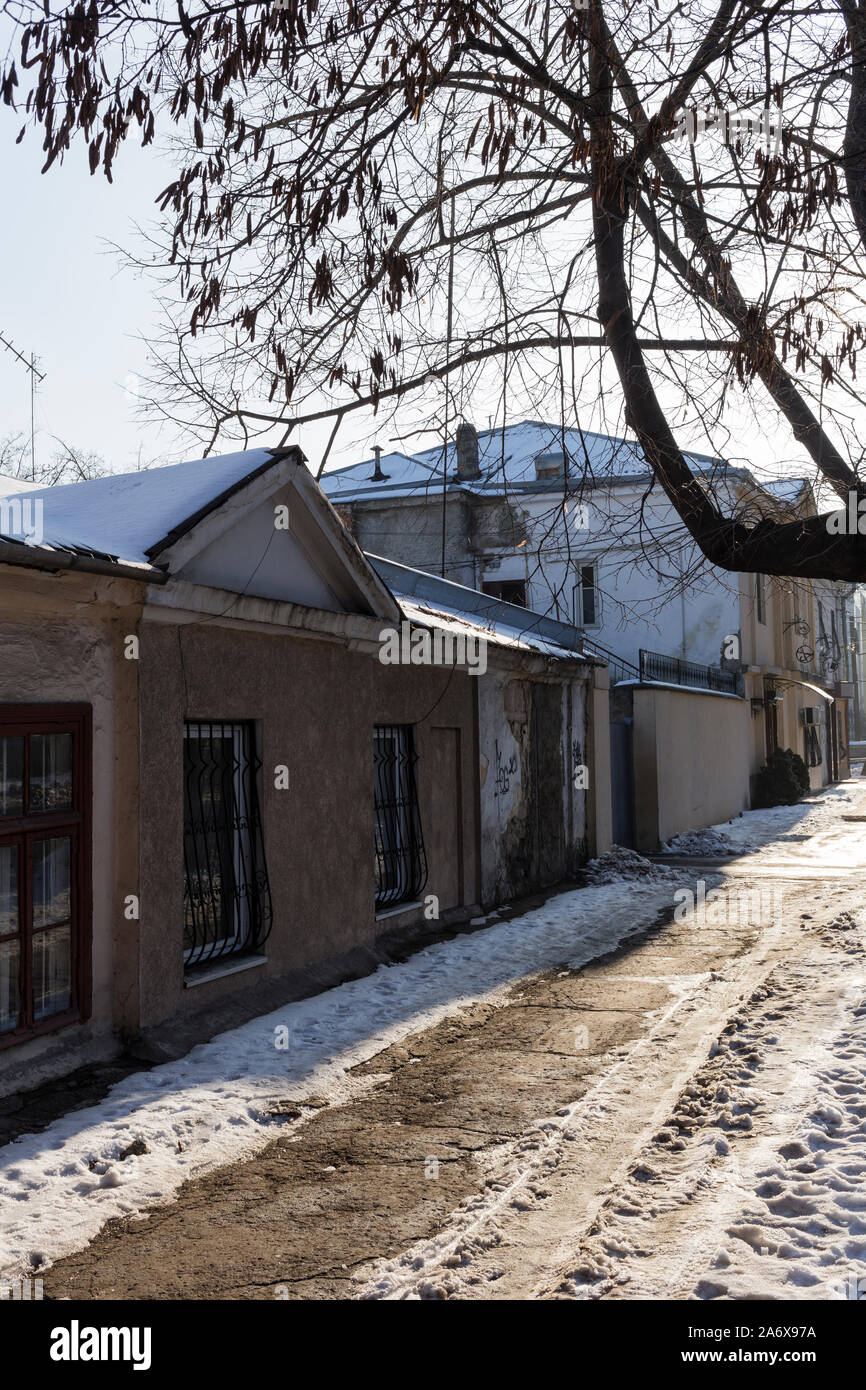 Winter street with a view of the houses Stock Photo - Alamy
