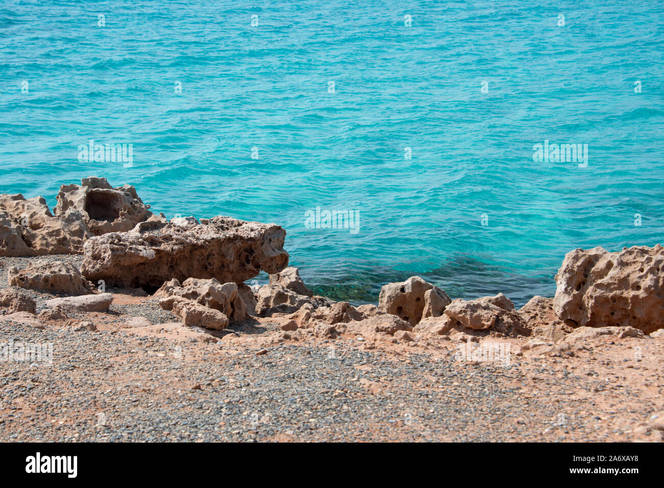 Sea shore with rocks and clear transparent sea water. Natural marine ...