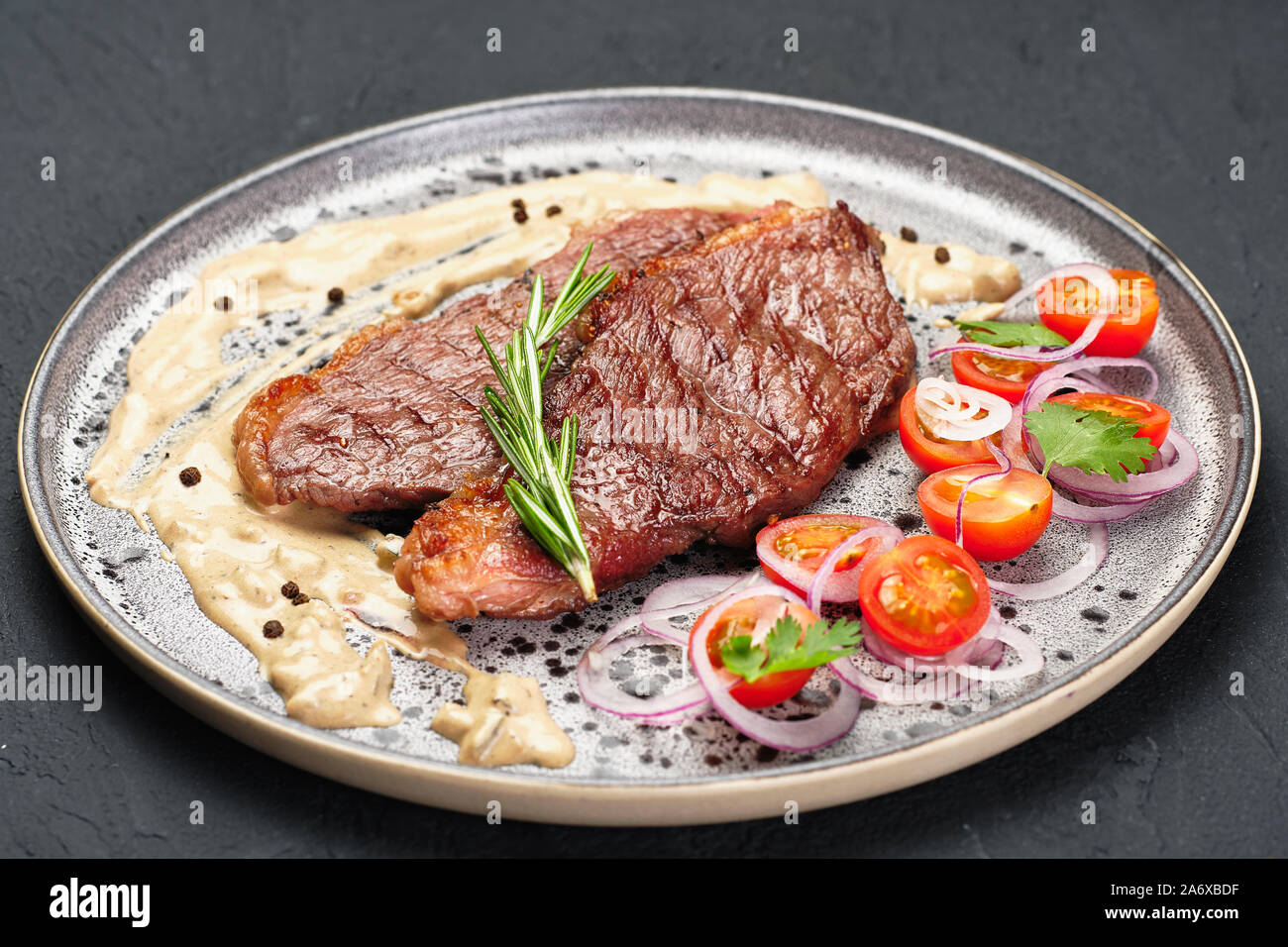 Fresh Cooked Meat on Metallic Plate Sliced Tomato Stock Photo - Alamy