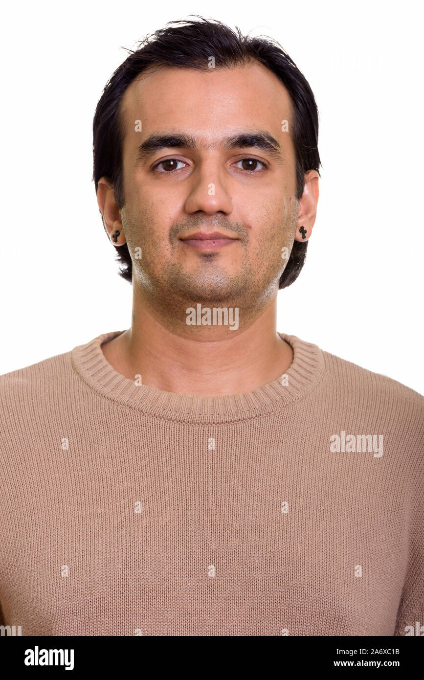 Face of Persian man with sweater looking at camera Stock Photo - Alamy