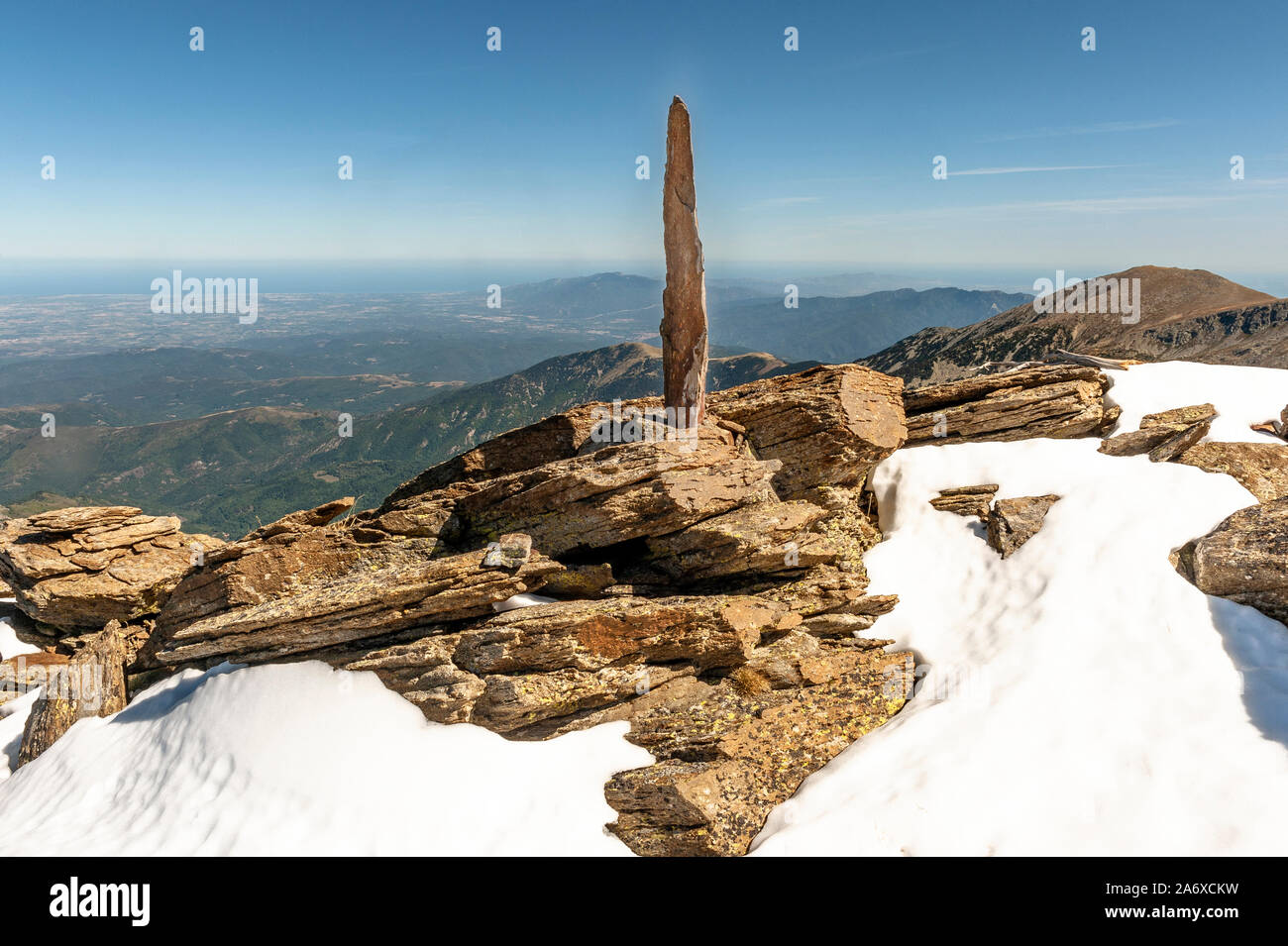 Natural stone stele pushed up by the forces of nature at Mount Canigou ...