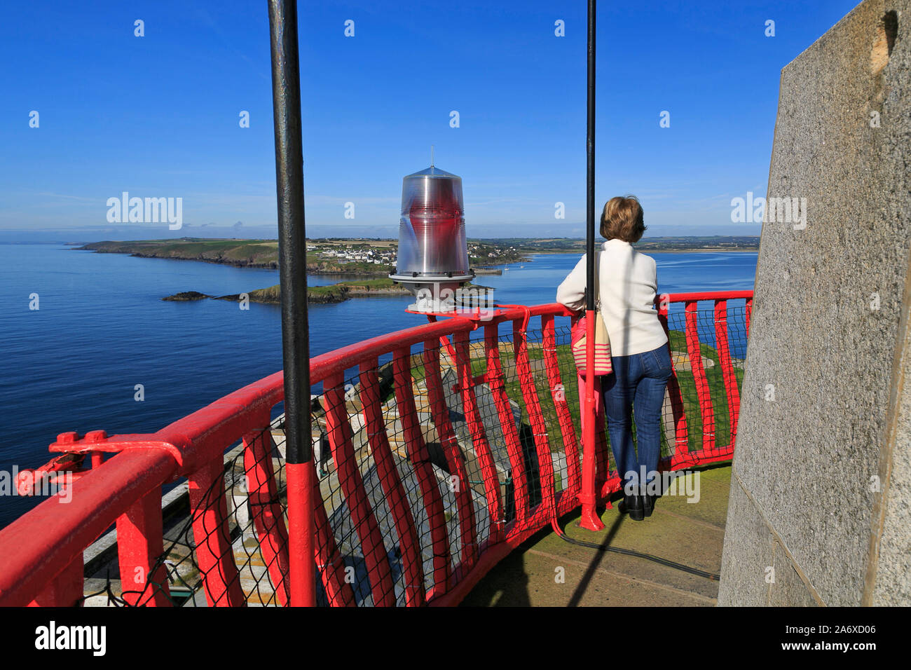 Tourist on the balcony, Ballycotton Lighthouse, County Cork, Ireland ...