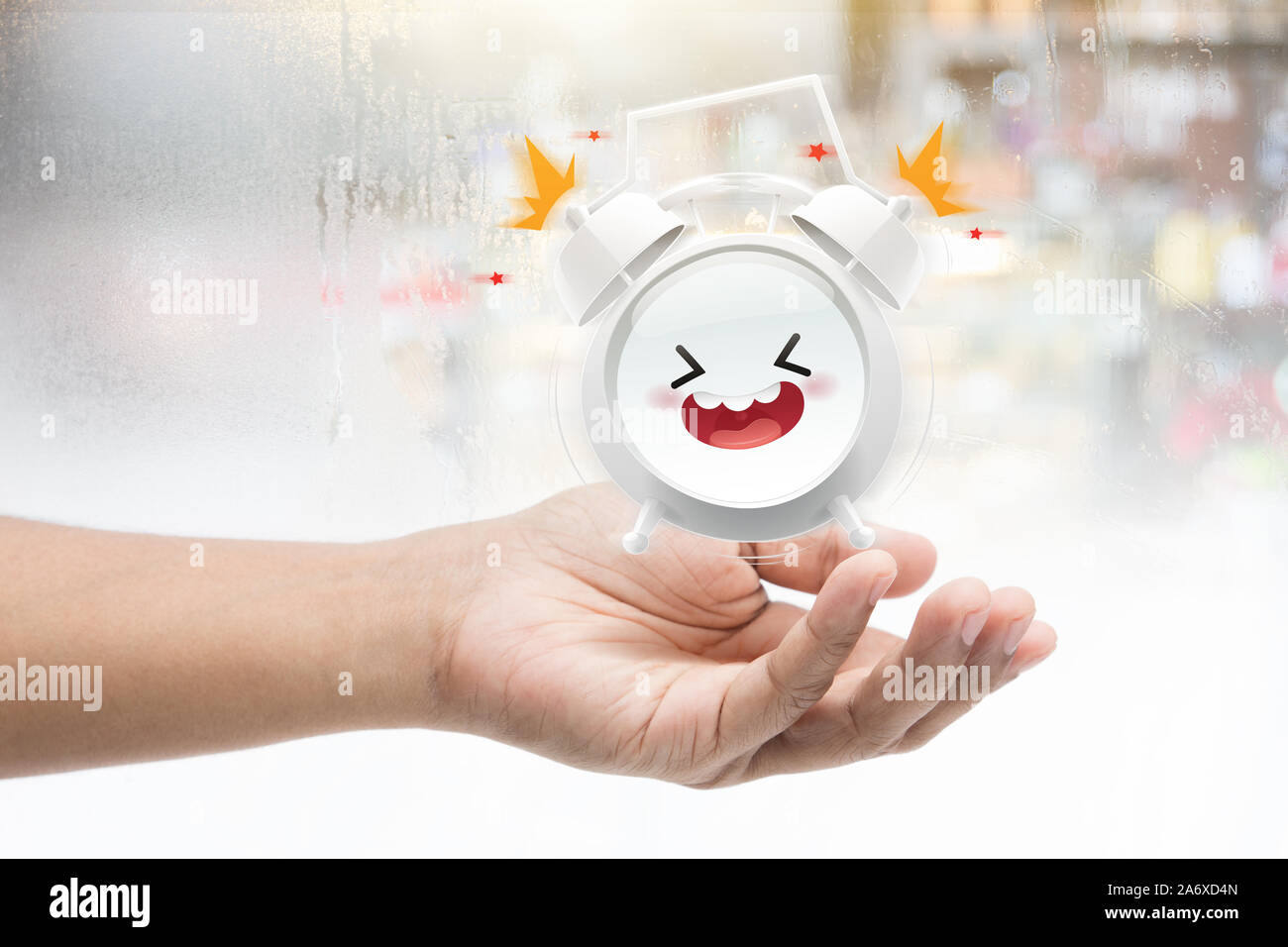 The cartoon alarm clock is happy in the morning on Man's hand, Good ...