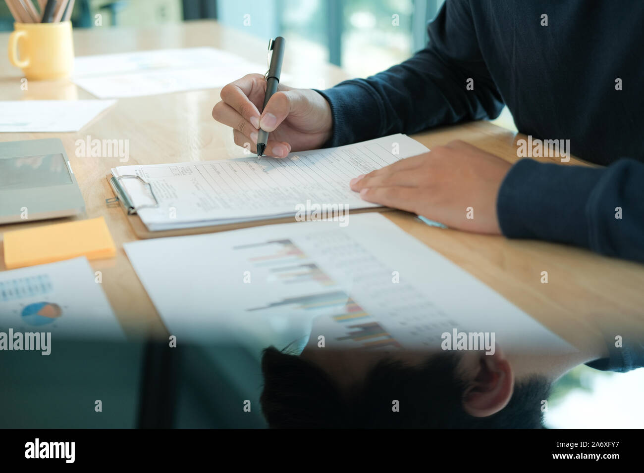 candidate applicant fill out application form. man signing contract ...