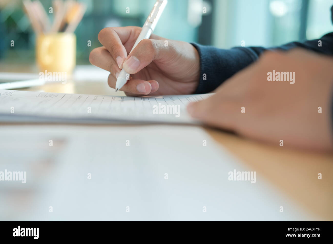 candidate applicant fill out application form. man signing contract ...