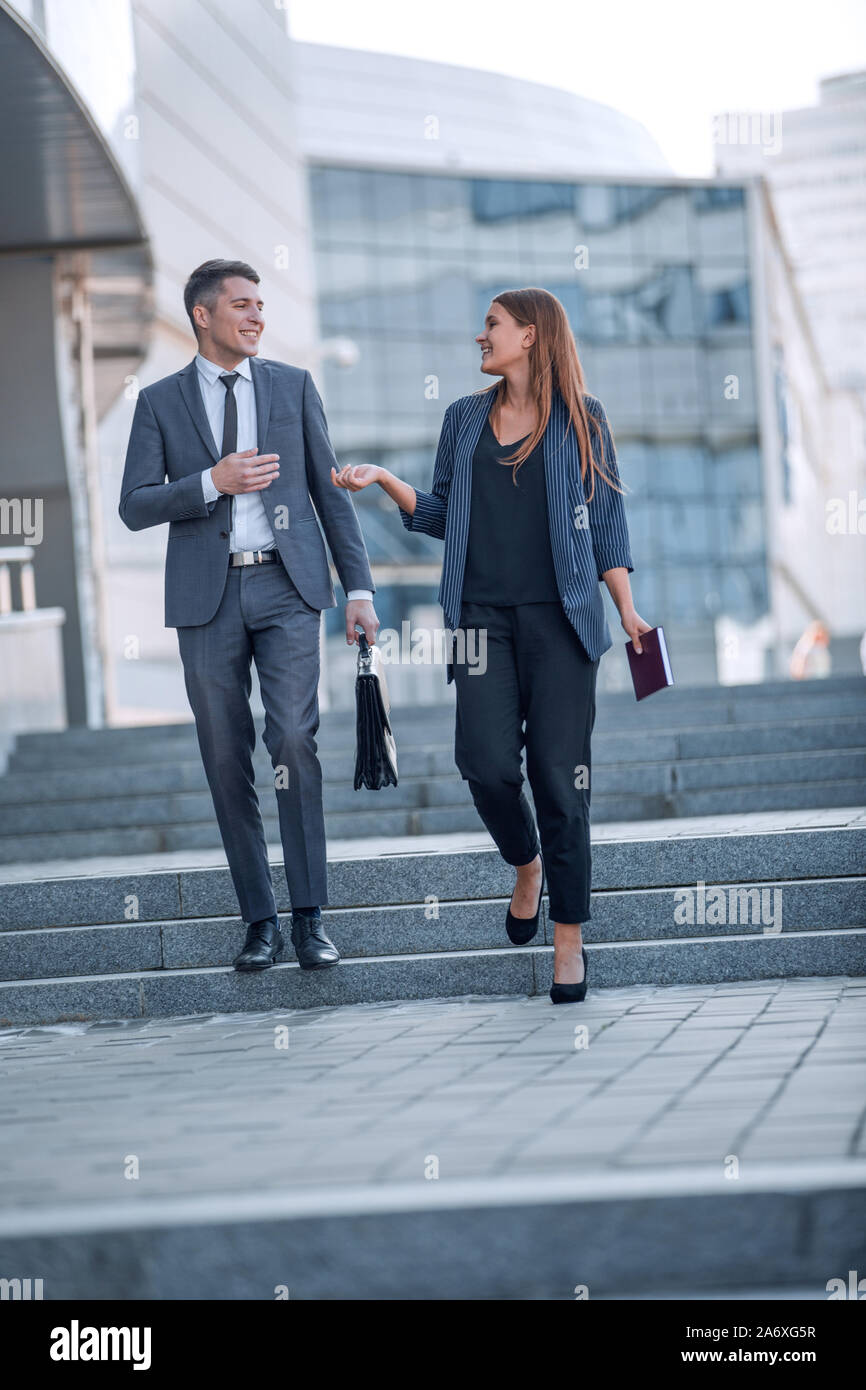 Happy handsome businessman walking down hi-res stock photography and ...
