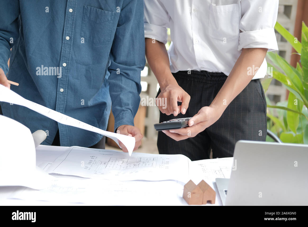 architect engineer working on house blueprint of real estate project at ...