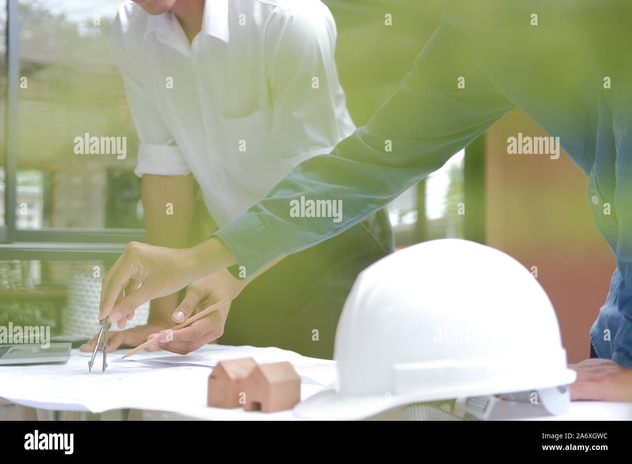 architect engineer working on house blueprint of real estate project at ...