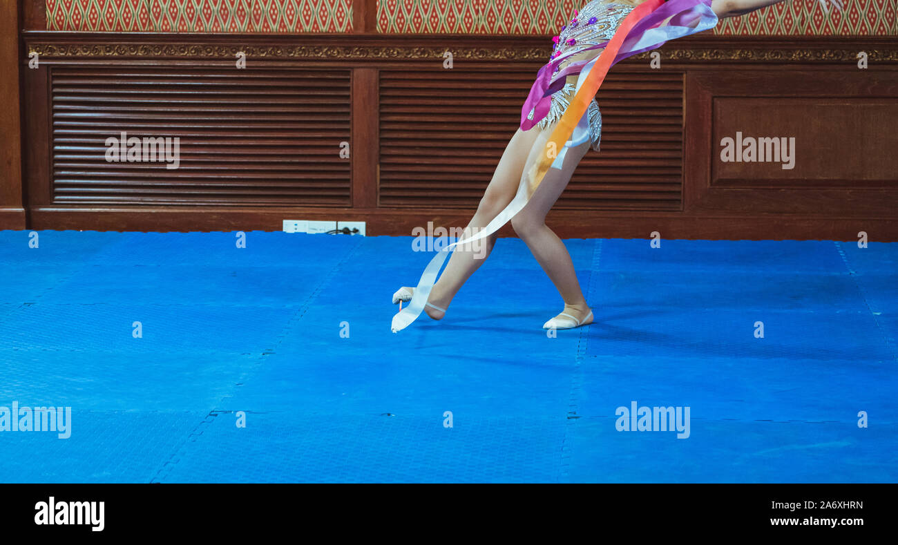 gymnast woman wearing sportswear dress performing gymnastics Stock ...