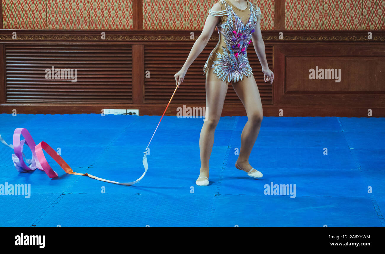 gymnast woman wearing sportswear dress performing gymnastics Stock ...