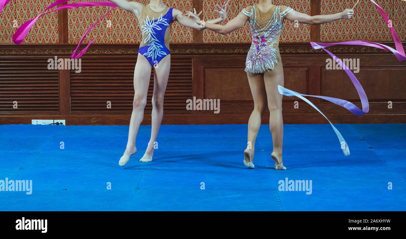 gymnast woman wearing sportswear dress performing gymnastics Stock ...